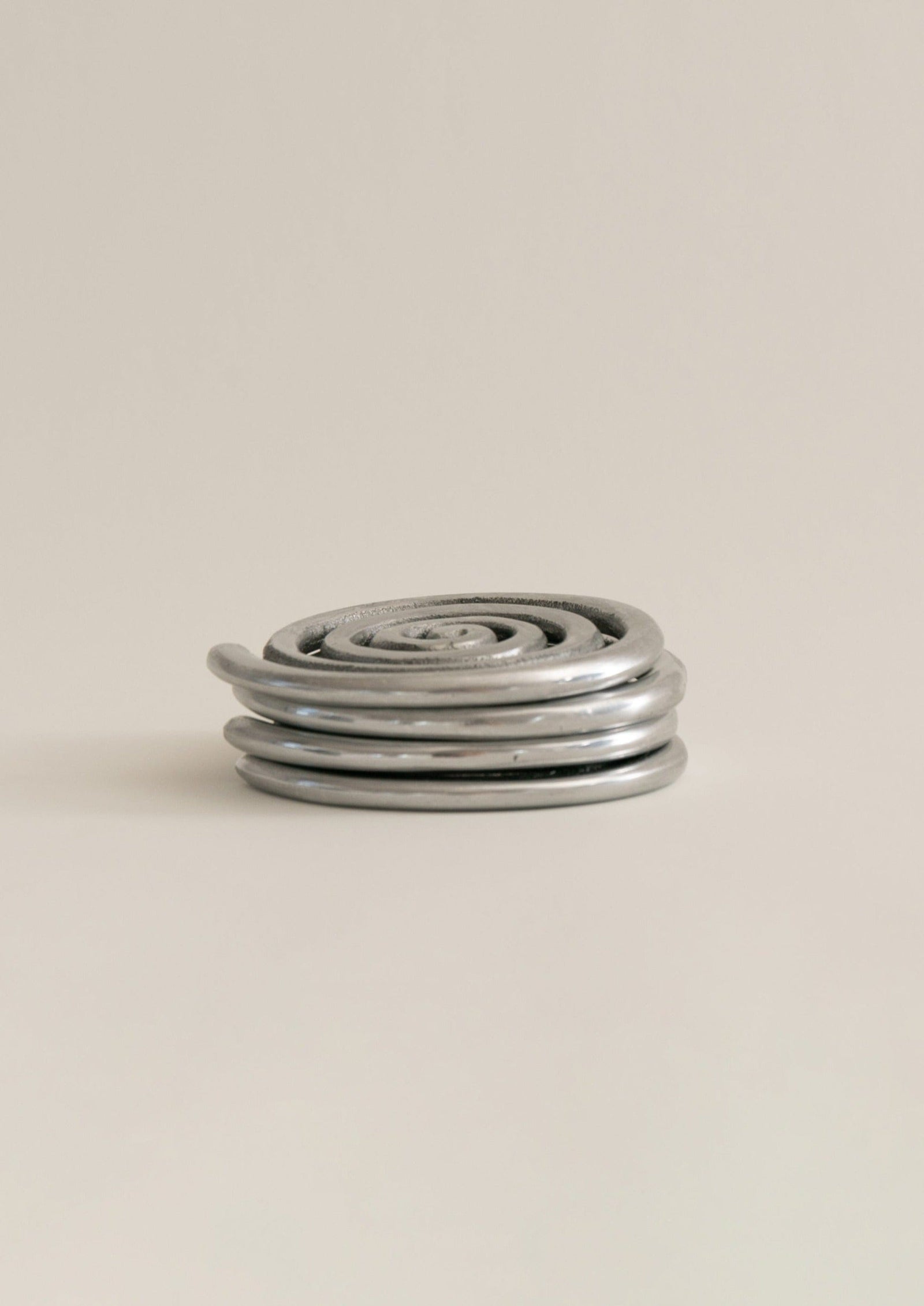 Sculptural Spiral Coasters – Set of 4 by Sophie Lou Jacobsen