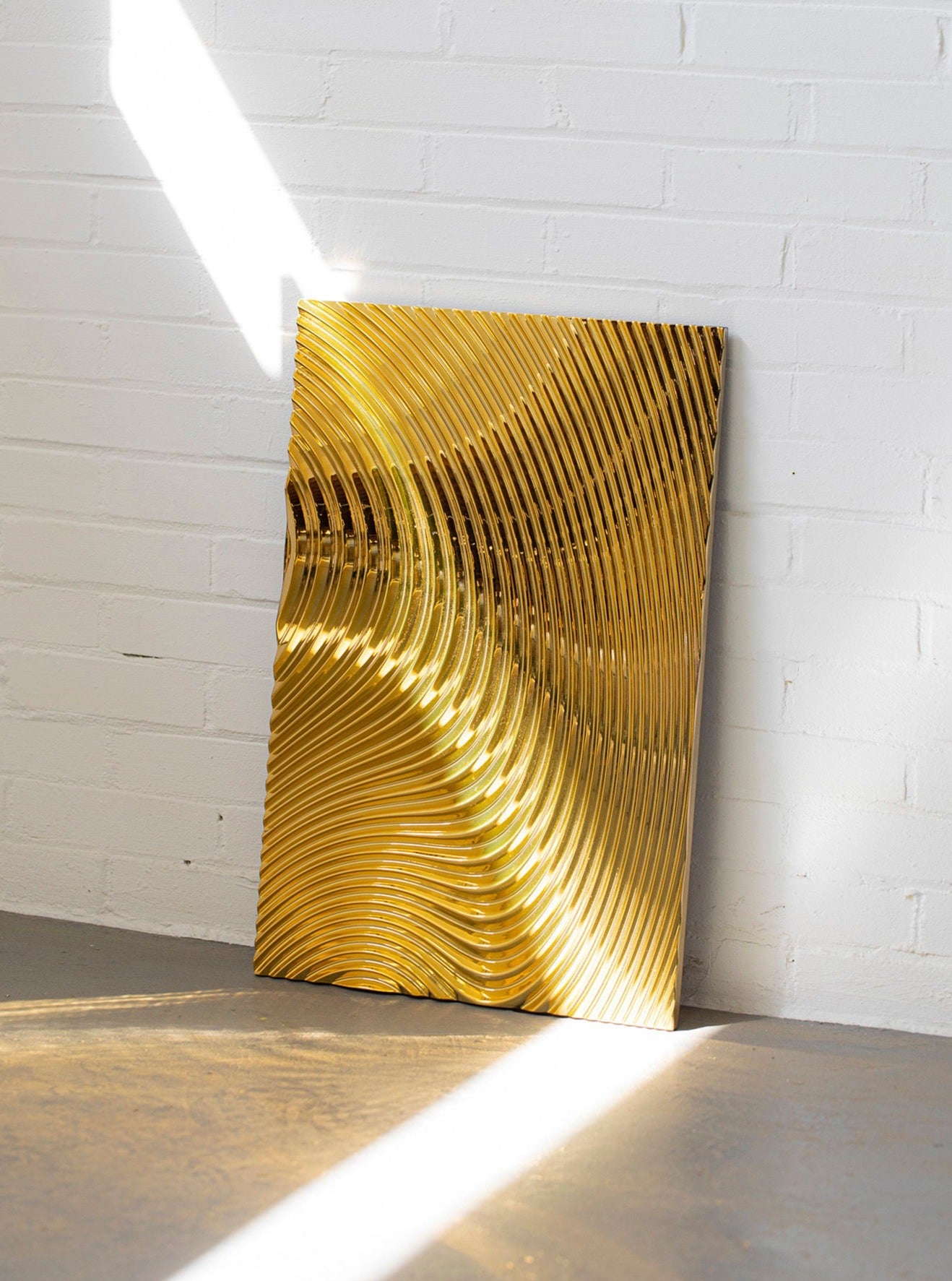 "Wave Chrome Gold Wallpanel by Studio Arno Hoogland"